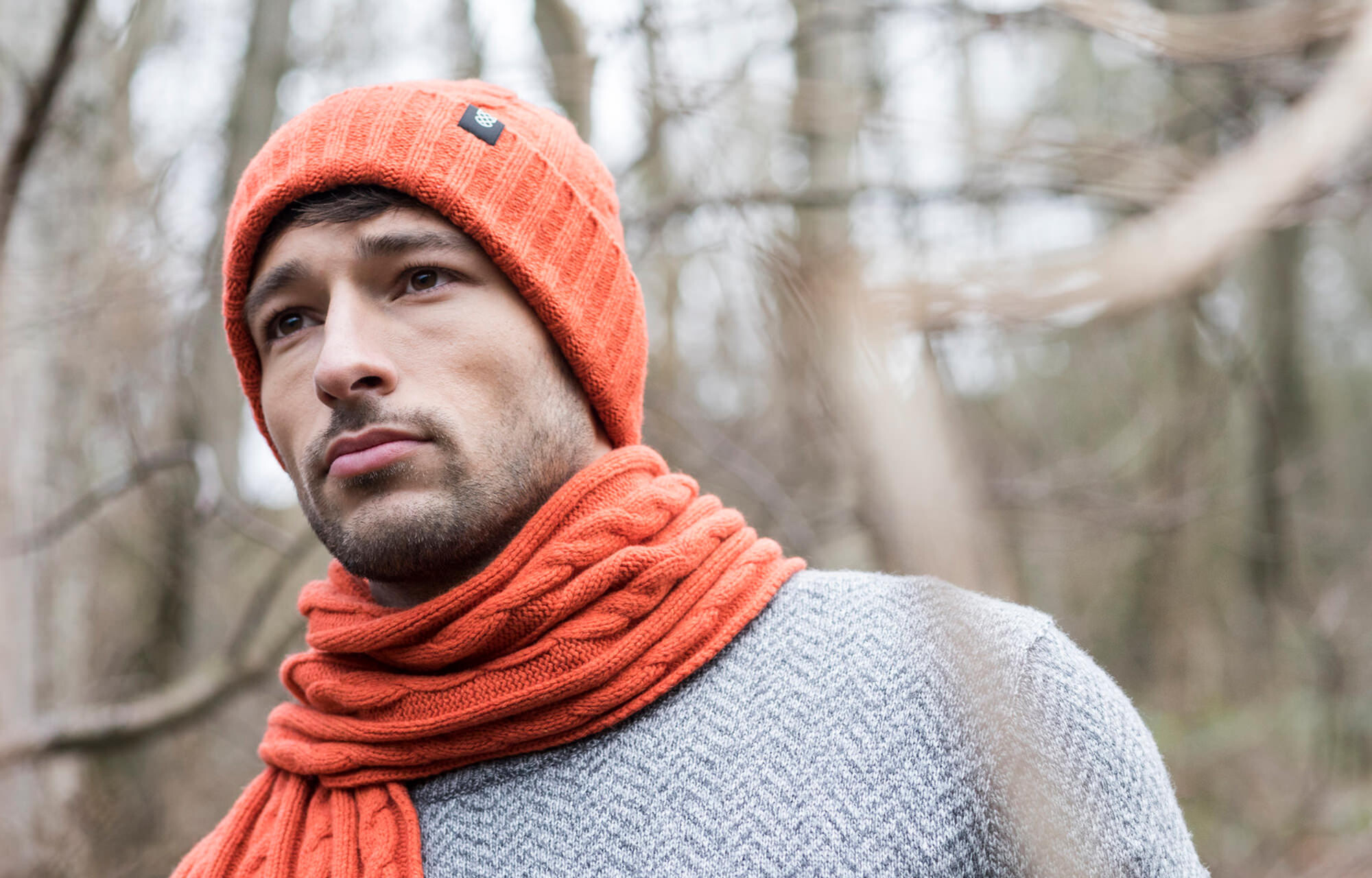 Man wearing Robert Mackie knitwear
